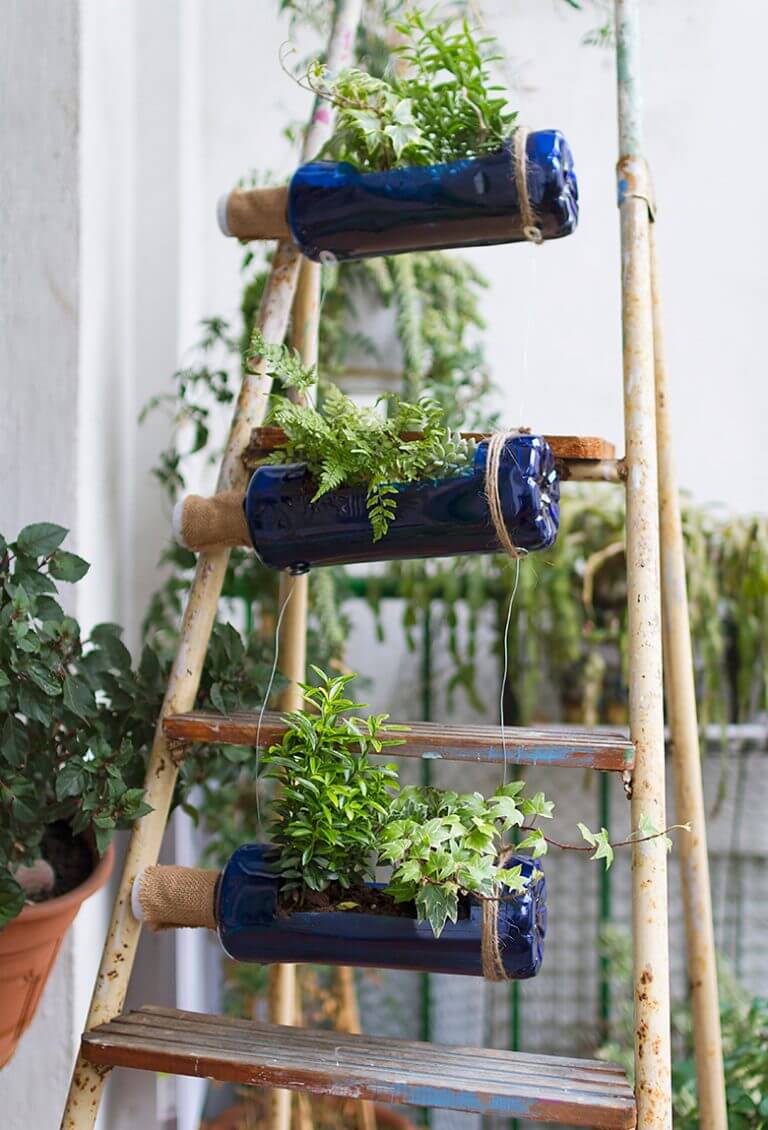 Haz maceteros con botellas plásticas y decora tu jardín | Manualidades eli